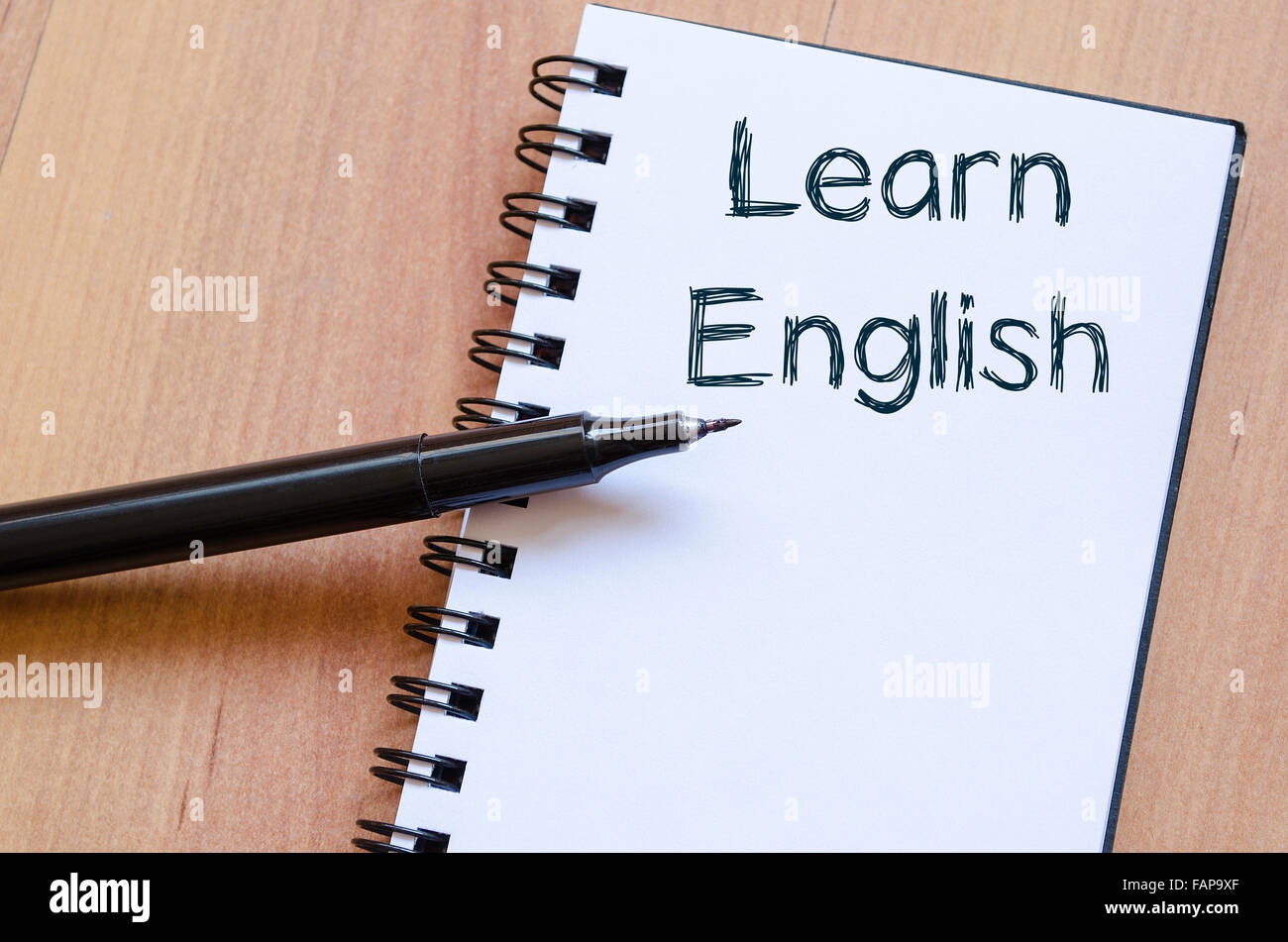Learn english text concept write on notebook with pen Stock Photo - Alamy