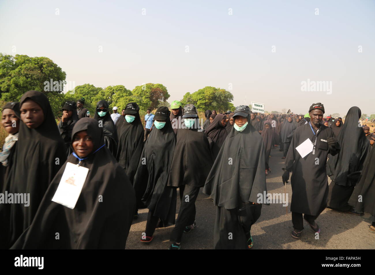 Shia Muslims march on the highway to commemorate the 40th anniversary ...