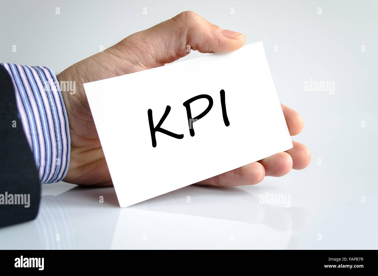 Kpi text concept isolated over white background Stock Photo - Alamy