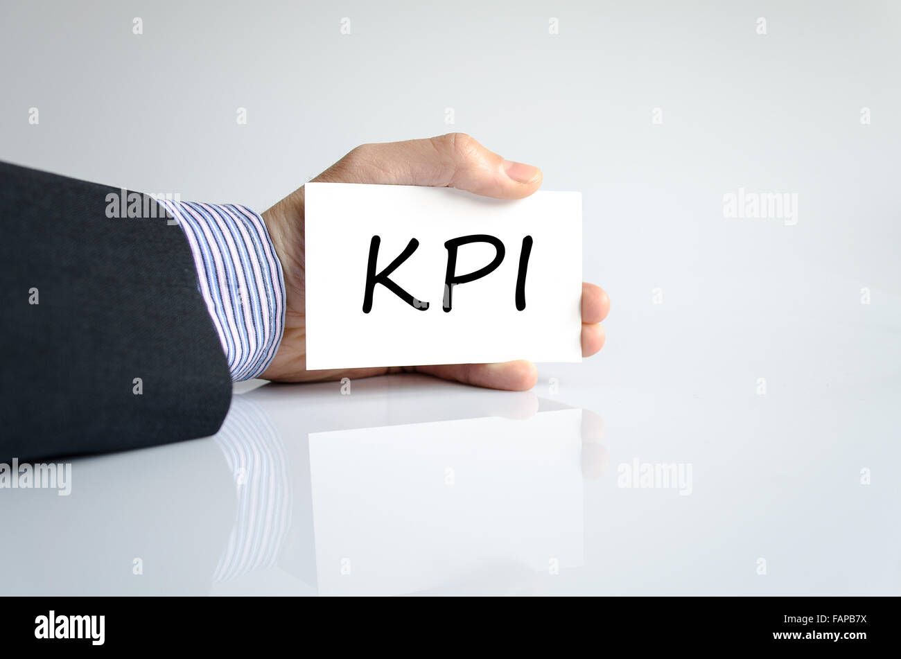 Kpi text concept isolated over white background Stock Photo - Alamy