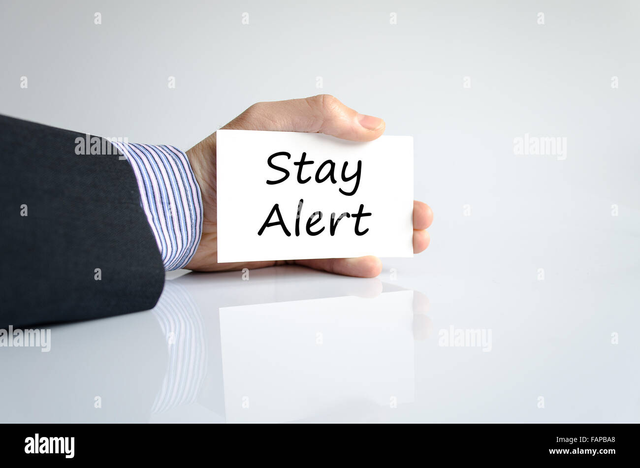 Stay alert text concept isolated over white background Stock Photo - Alamy