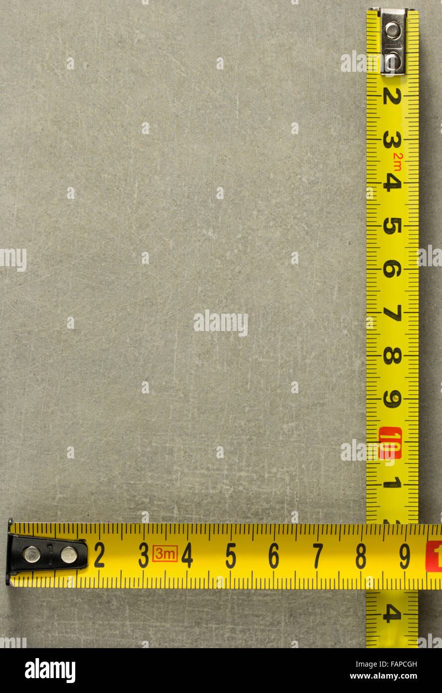tape measure at old background texture Stock Photo - Alamy