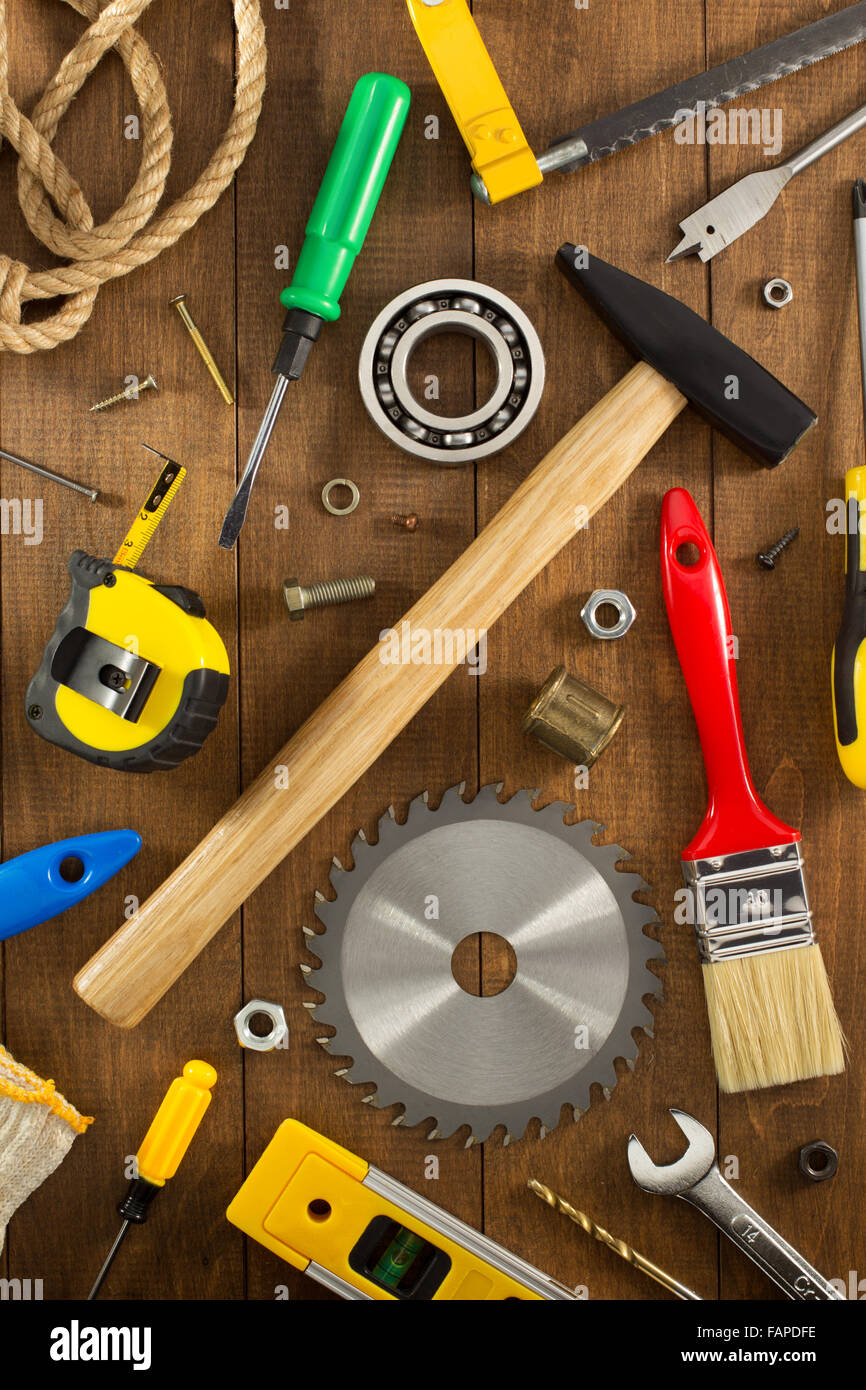 work tools and instruments on wooden background Stock Photo - Alamy
