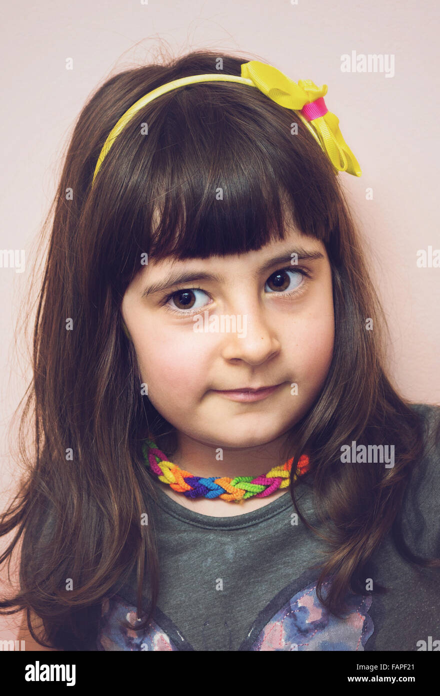 Cute child girl portrait at home in soft tones Stock Photo - Alamy