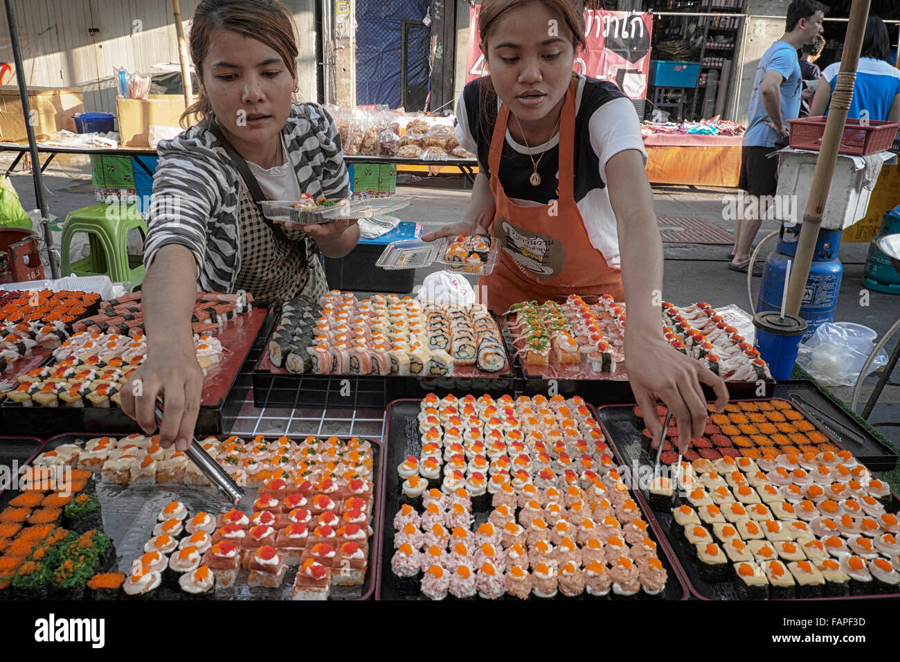 Sushi stall at a Thailand open air street food market. Thailand. S. E ...