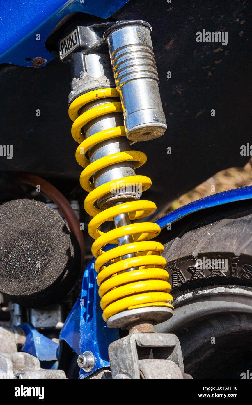 Motor Scooter, Italjet Dragster 180. Close up of bright yellow coiled ...