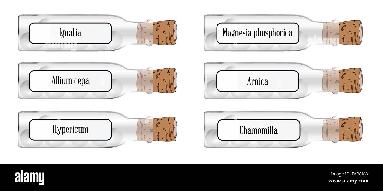 Homeopathic glass remedy bottles with labels and contents all over a ...