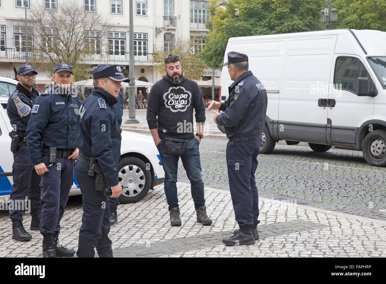 A group of police officers on patrol in Lisbon Portugal Stock Photo - Alamy