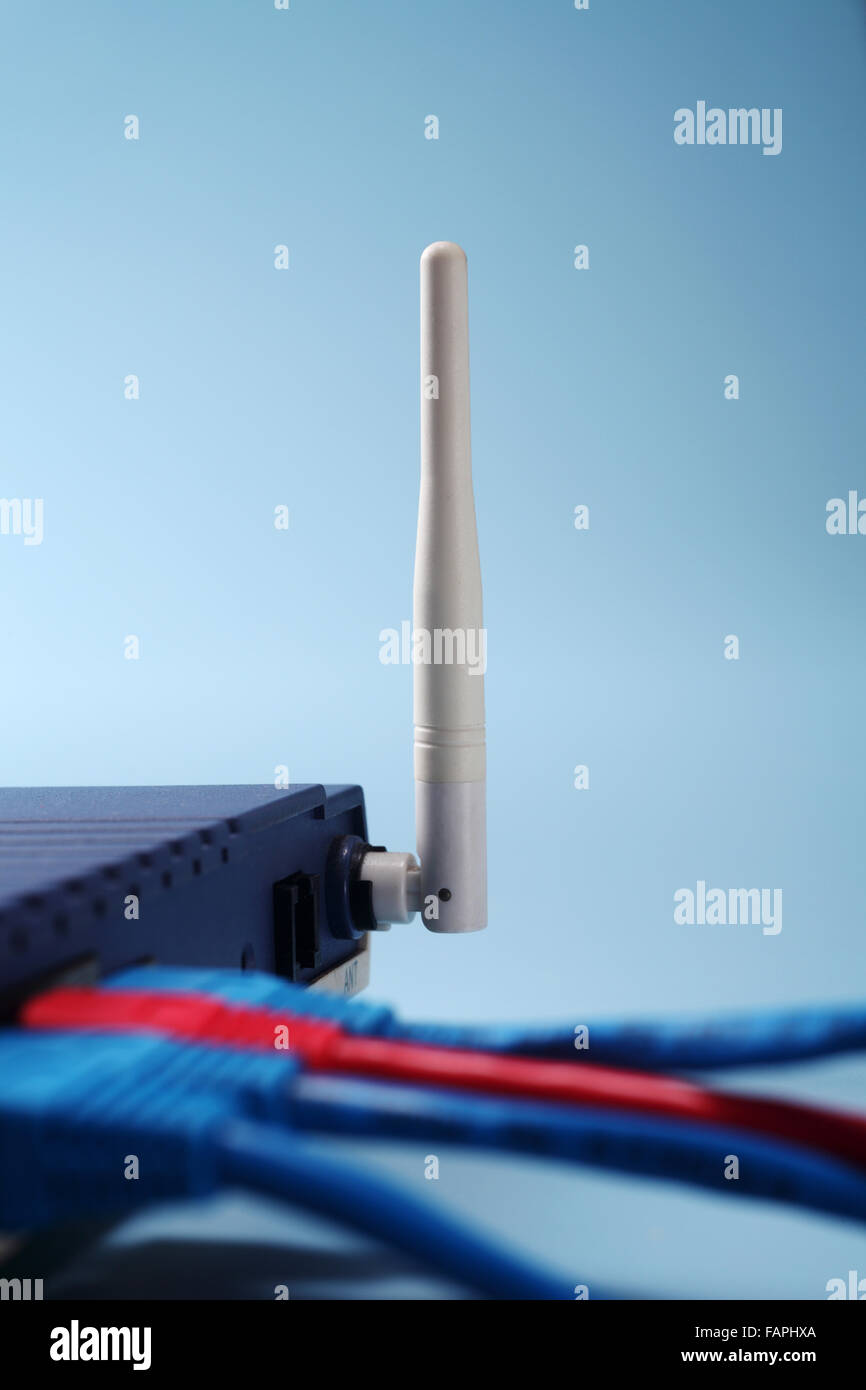 Wireless computer router with cables Stock Photo - Alamy