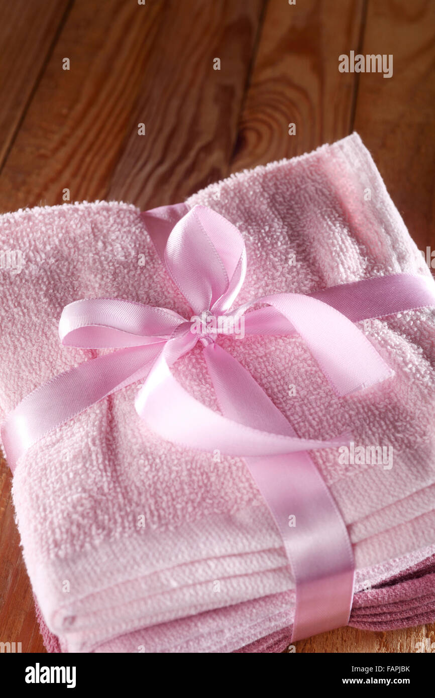 stack of the towel with ribbon Stock Photo - Alamy
