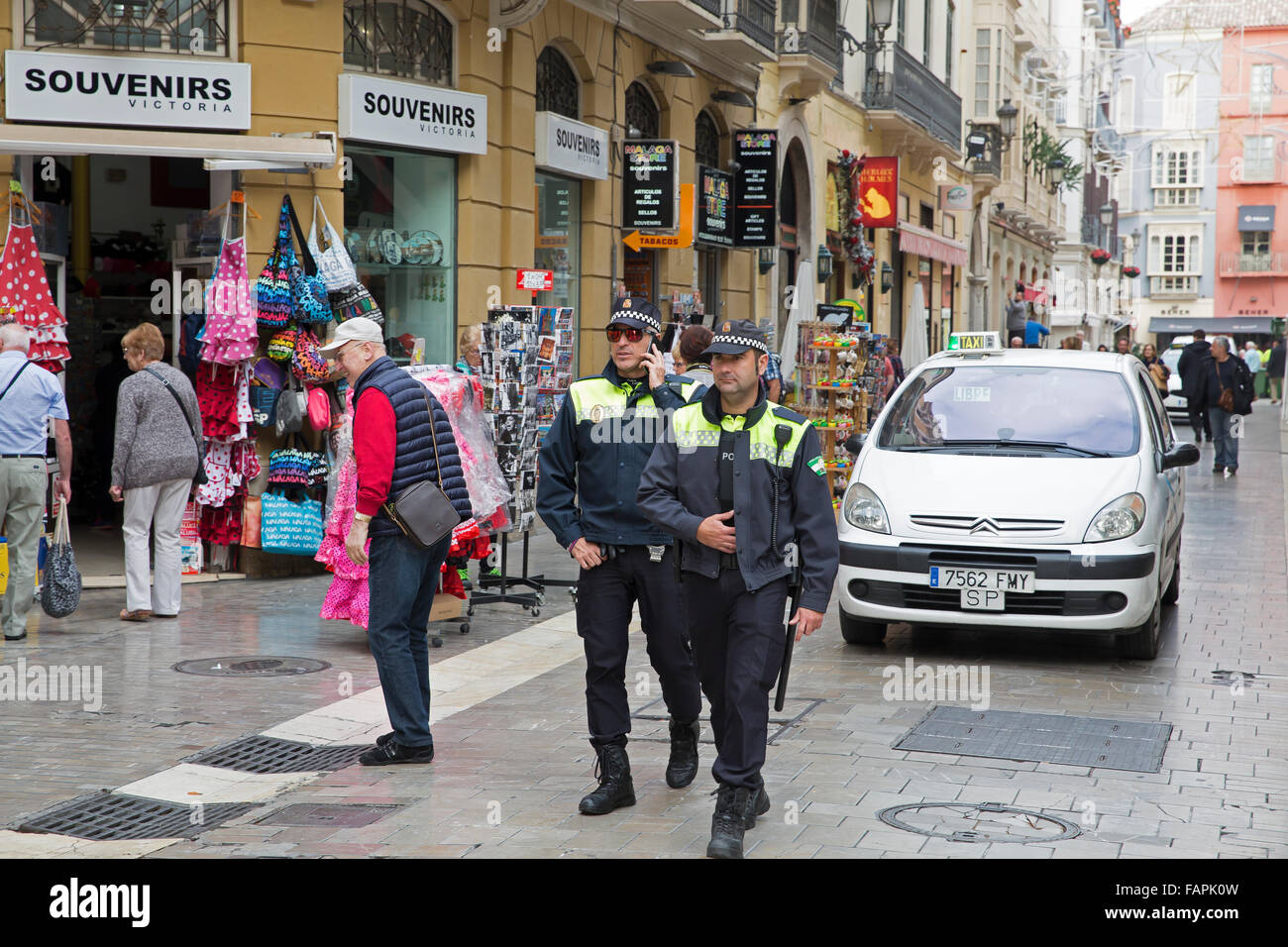 Police on duty in the main shoppping area of Malaga in Spain Stock ...
