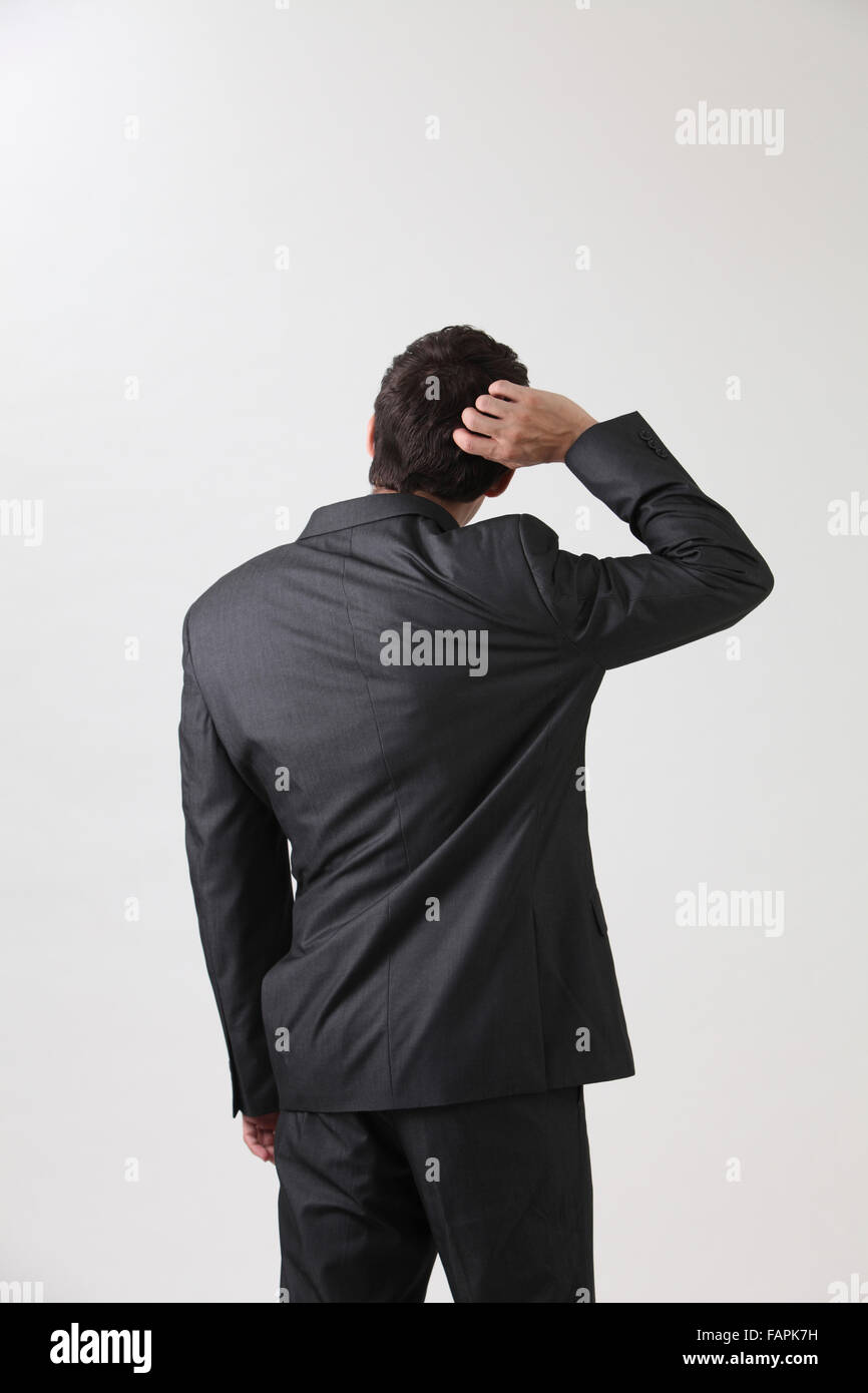 Man scratching his head Stock Photo - Alamy