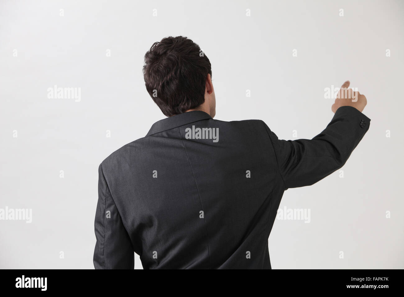 Person behind pointing hi-res stock photography and images - Alamy