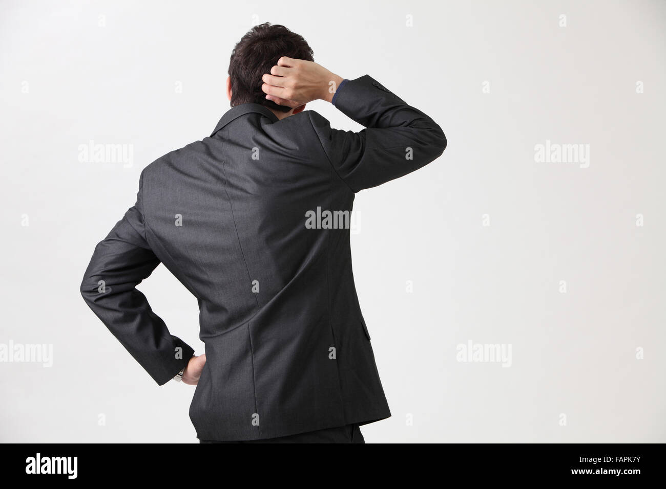 Man scratching his head Stock Photo - Alamy