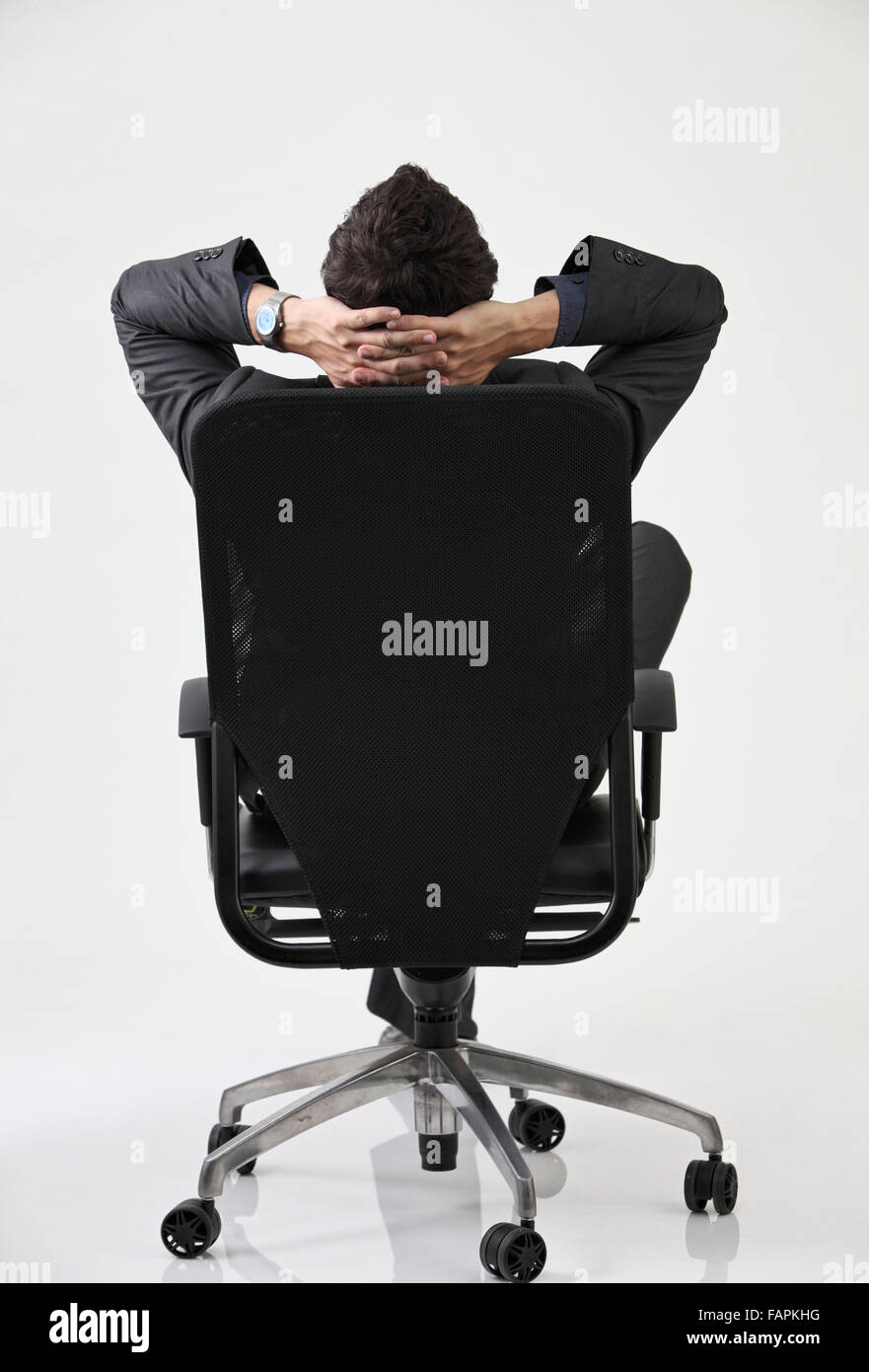back view of businessman sitting at the chair Stock Photo - Alamy