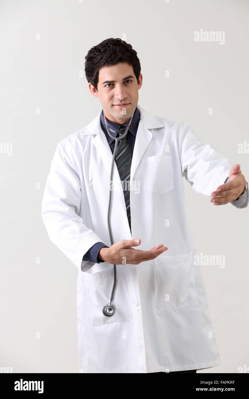 Confident doctor portrait in white background Stock Photo - Alamy