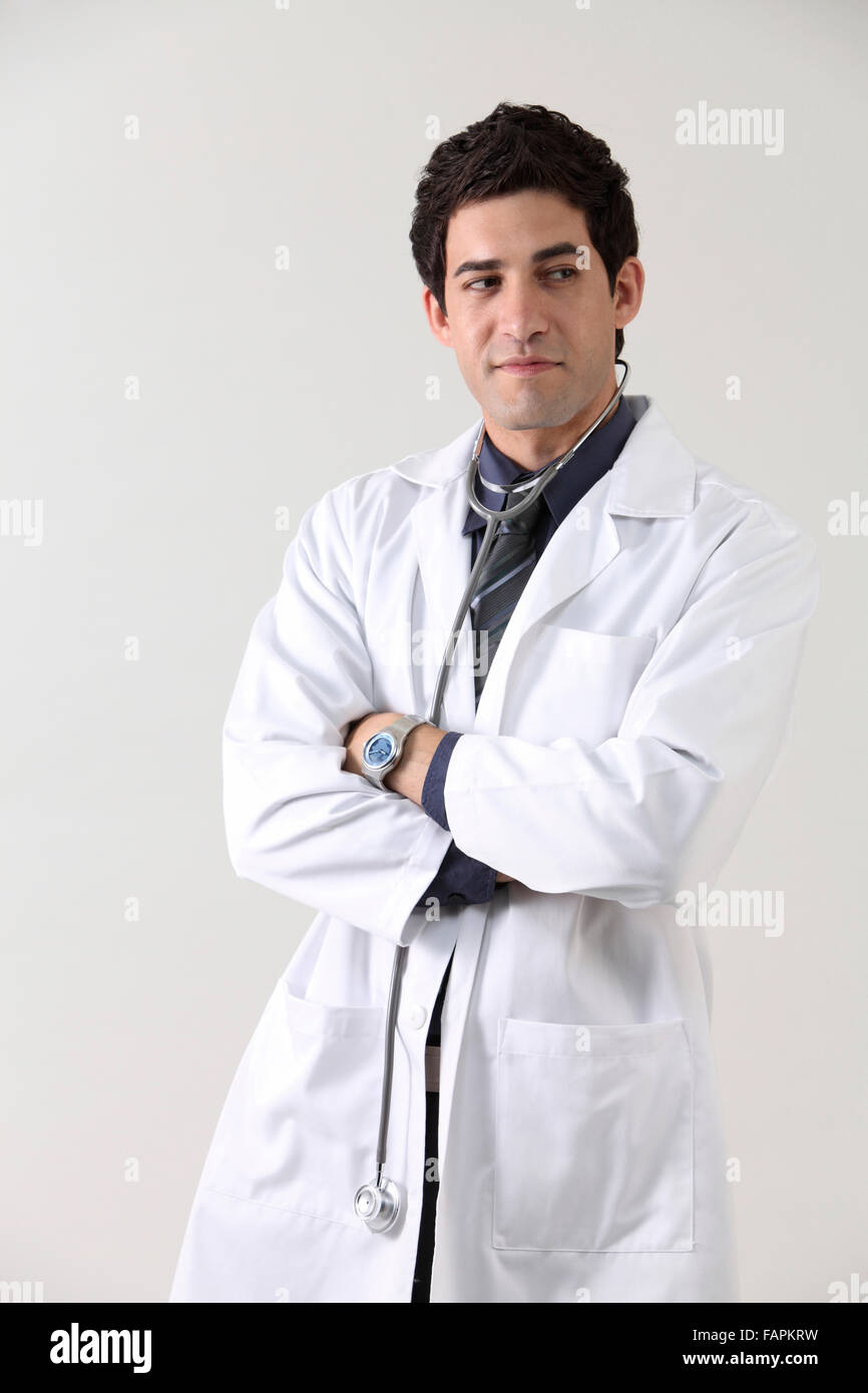 doctar looking away in white background Stock Photo - Alamy