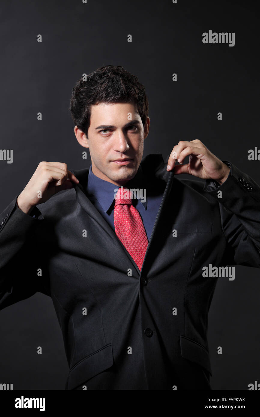 man adjusting his Business Clothing Stock Photo - Alamy