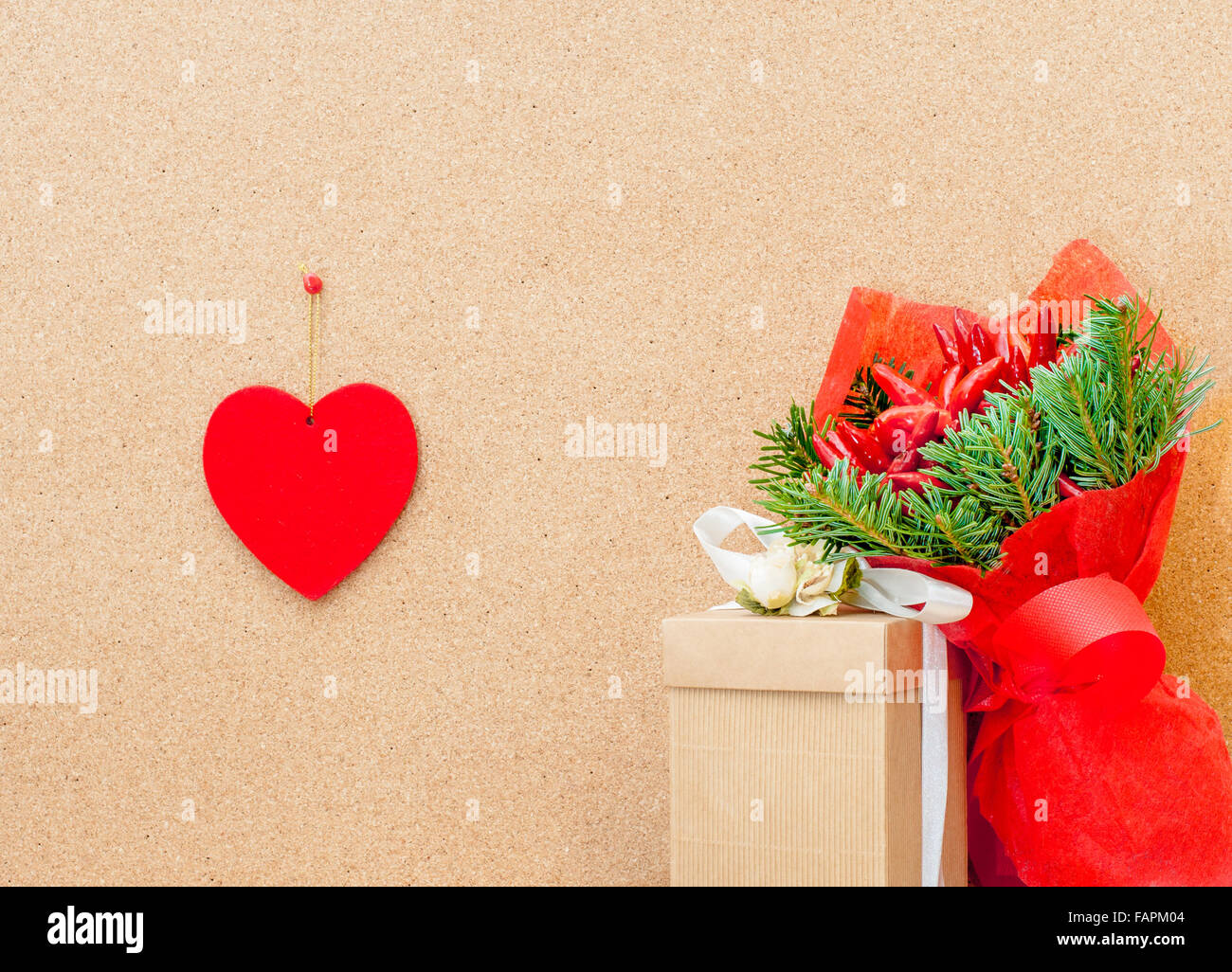 Valentine's day red heart pinned, gift box and hot chilli peppers ...