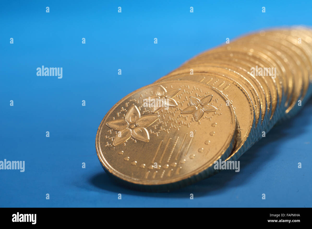 close up of the coins in a row Stock Photo - Alamy