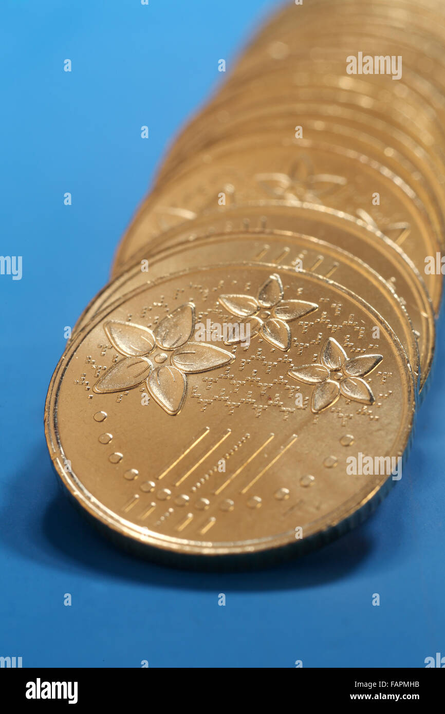close up of the coins in a row Stock Photo - Alamy