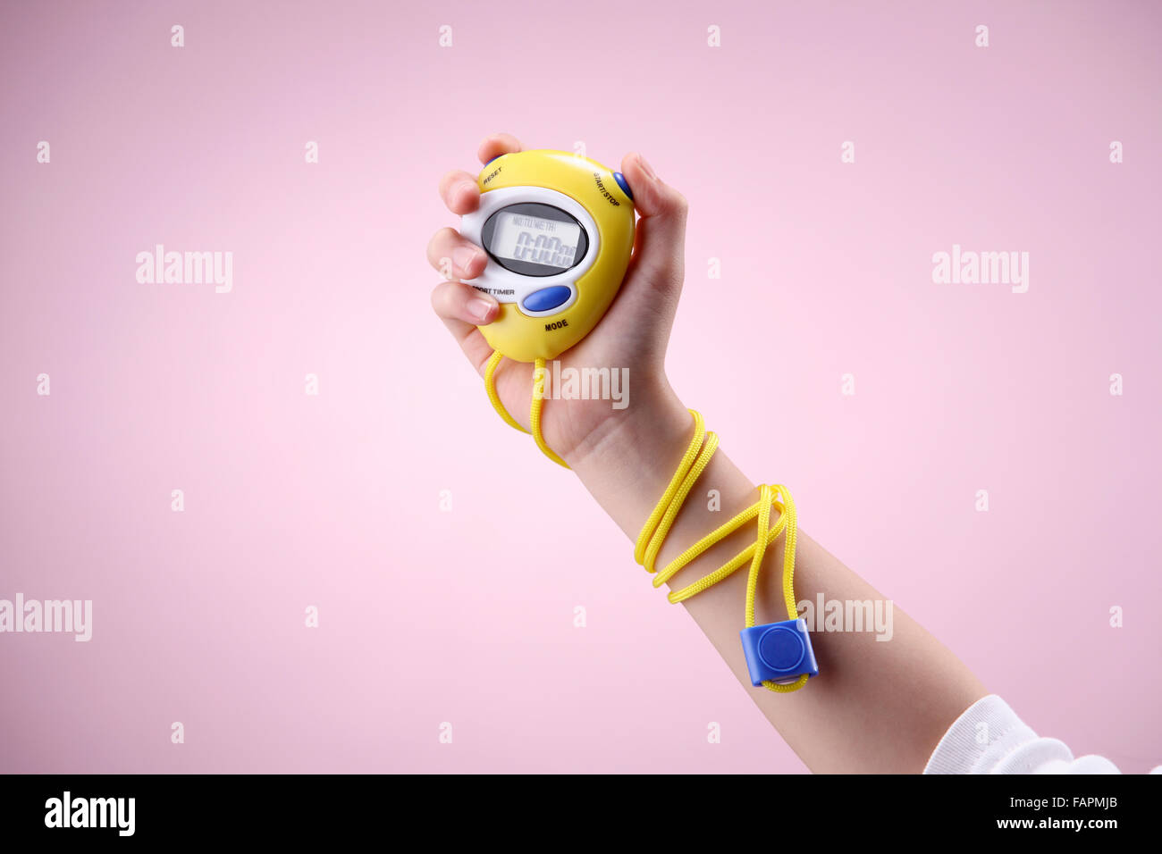 kid holding a digital stopwatch Stock Photo - Alamy