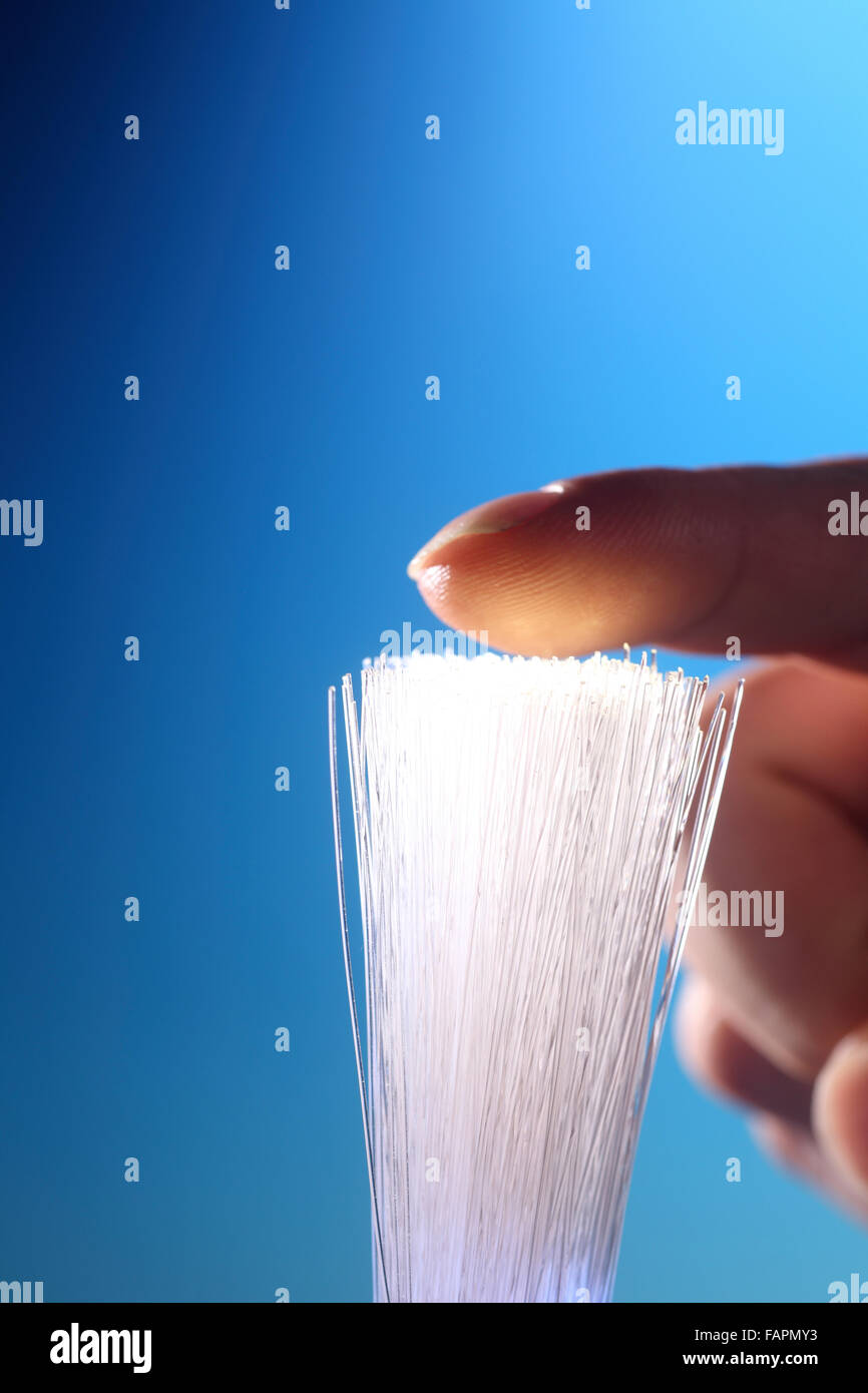 close up of the finger and fiber optic Stock Photo - Alamy