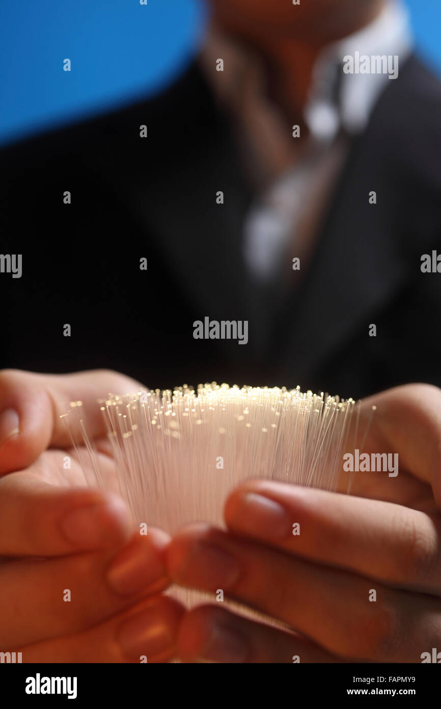 business man with bundle of fiber optic Stock Photo - Alamy