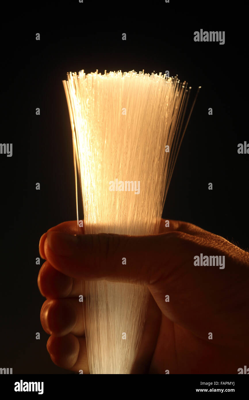 hand holding bundlle of fiber optic Stock Photo - Alamy