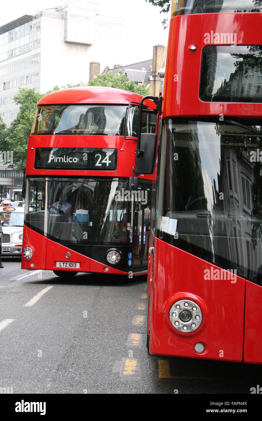 TWO NEW ROUTEMASTER BUSES IN LONDON Stock Photo - Alamy