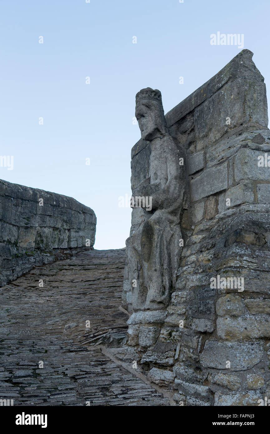 Statue on the unique three way Trinity bridge in Crowland Lincolnshire ...
