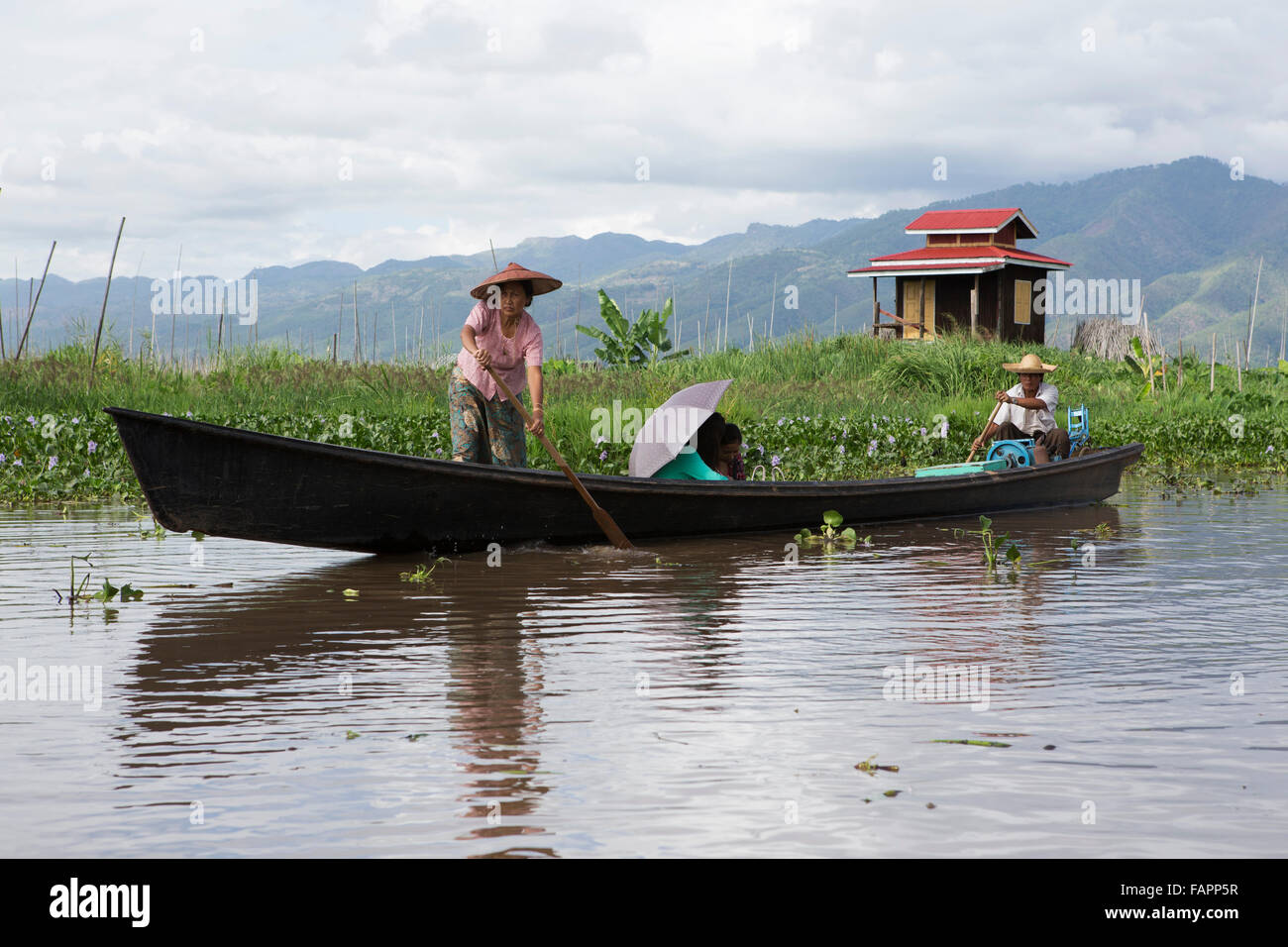 Intha people in a boat on Inle Lake in Myanmar (Burma). Boats are used ...