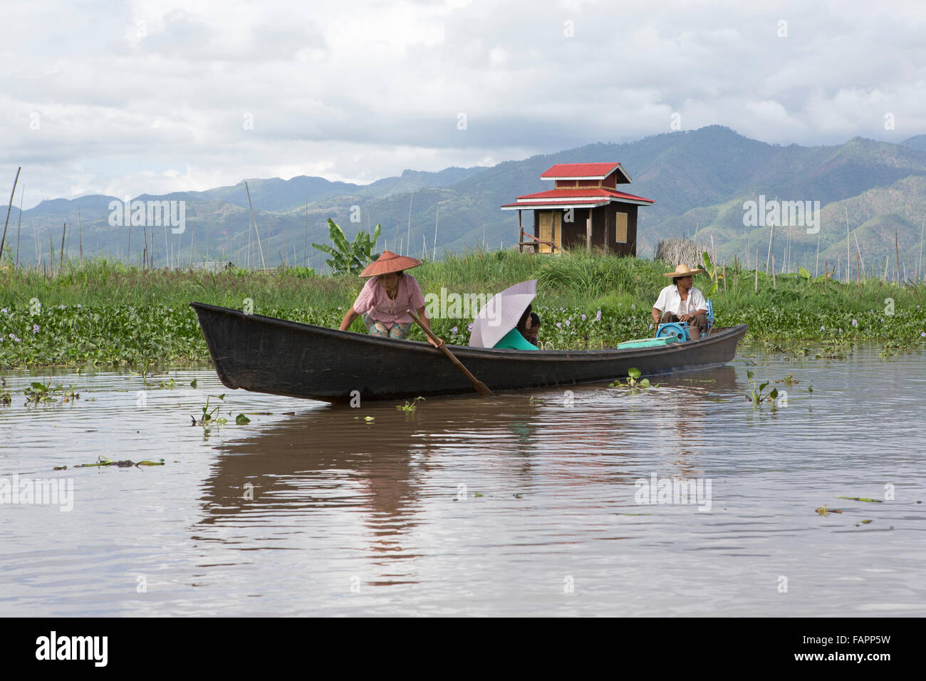 Intha people in a boat on Inle Lake in Myanmar (Burma). Boats are used ...