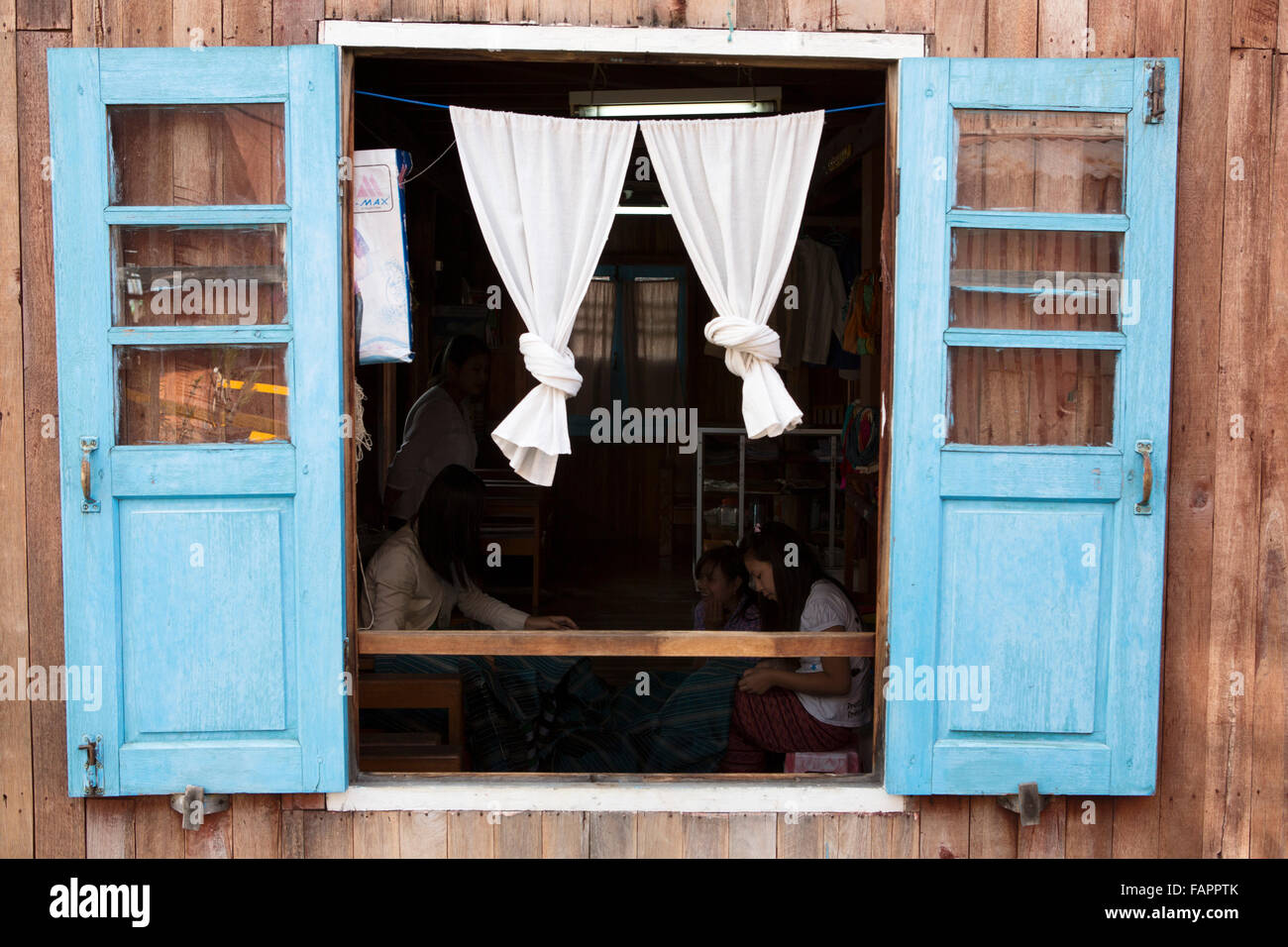 Window of a lotus weaving workshop on Inle Lake in Myanmar (Burma). The ...