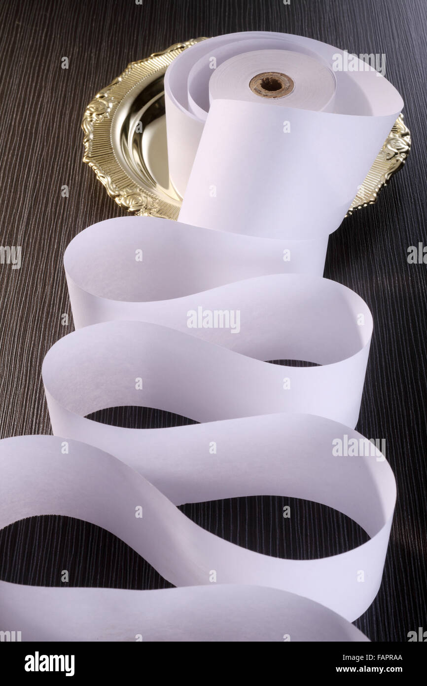 stock image of roll of the adding machine tape Stock Photo - Alamy