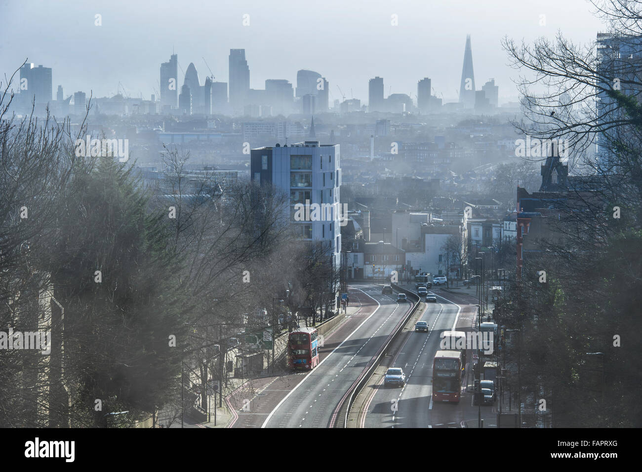 City of London skyline with mist early in the morning Stock Photo - Alamy