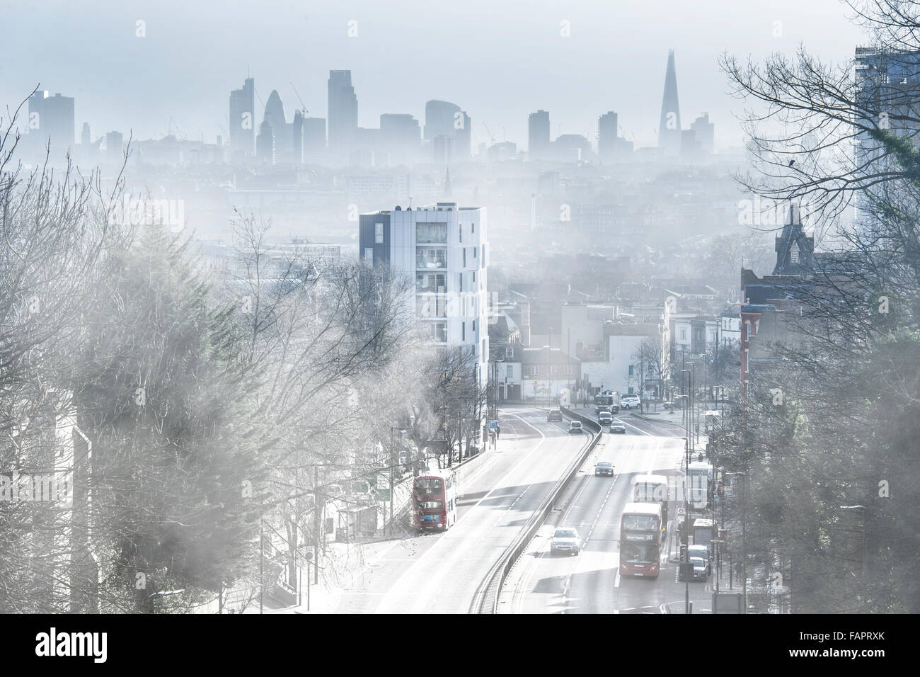 City of London skyline with snow and mist early in the morning Stock ...