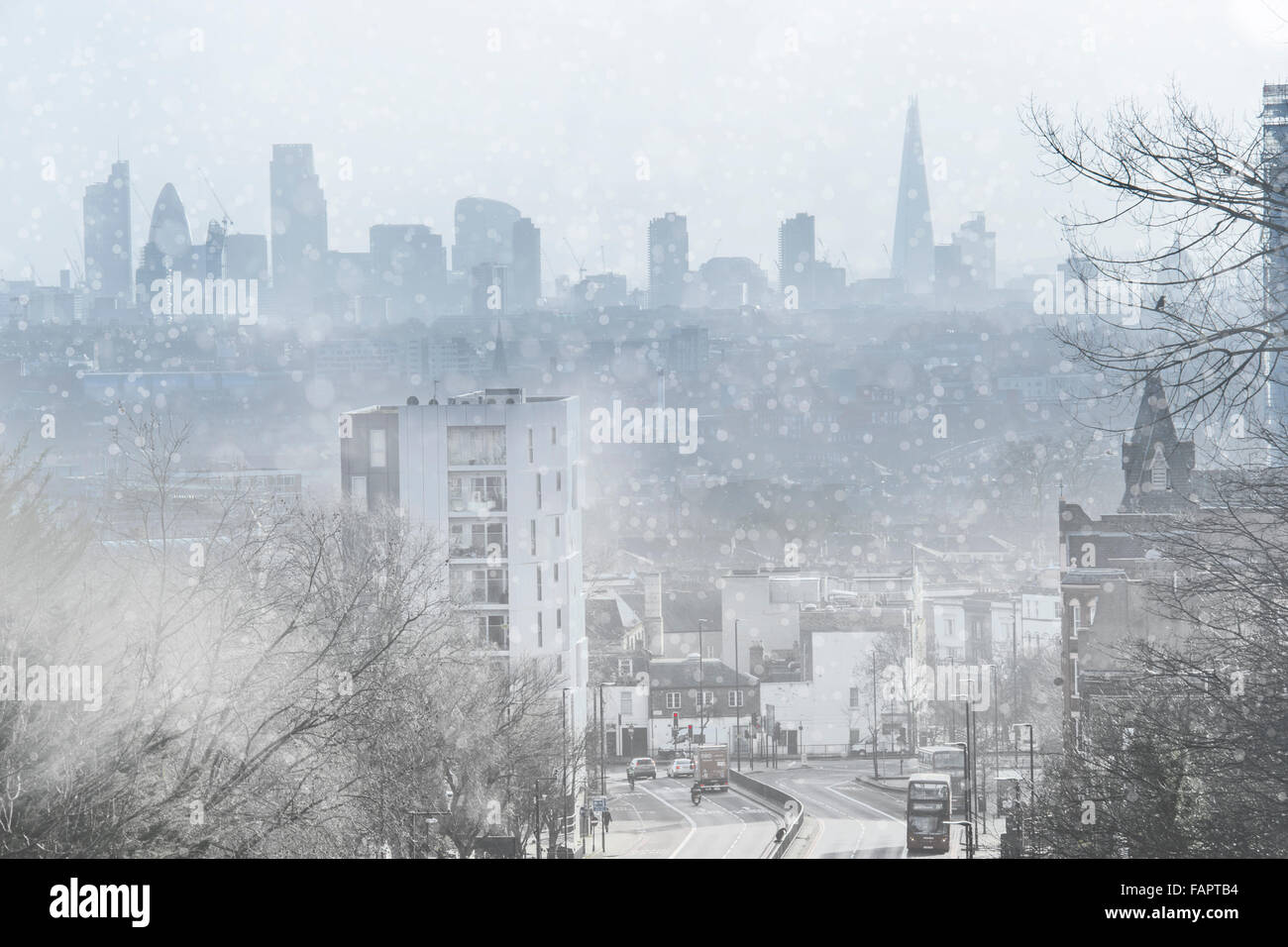 City of London skyline with snow and mist early in the morning Stock ...