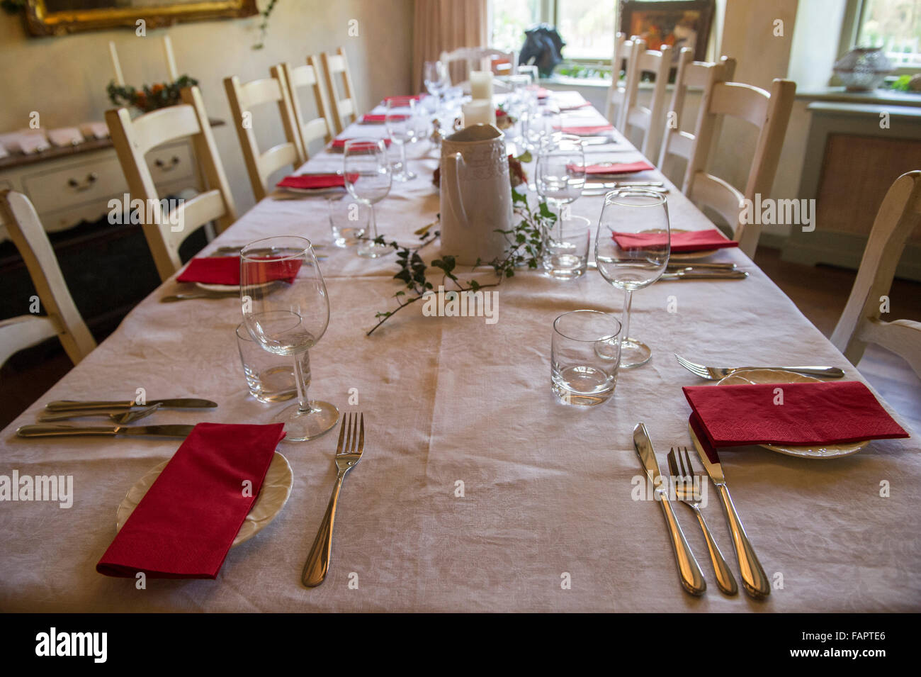 Long table red chairs hi-res stock photography and images - Alamy