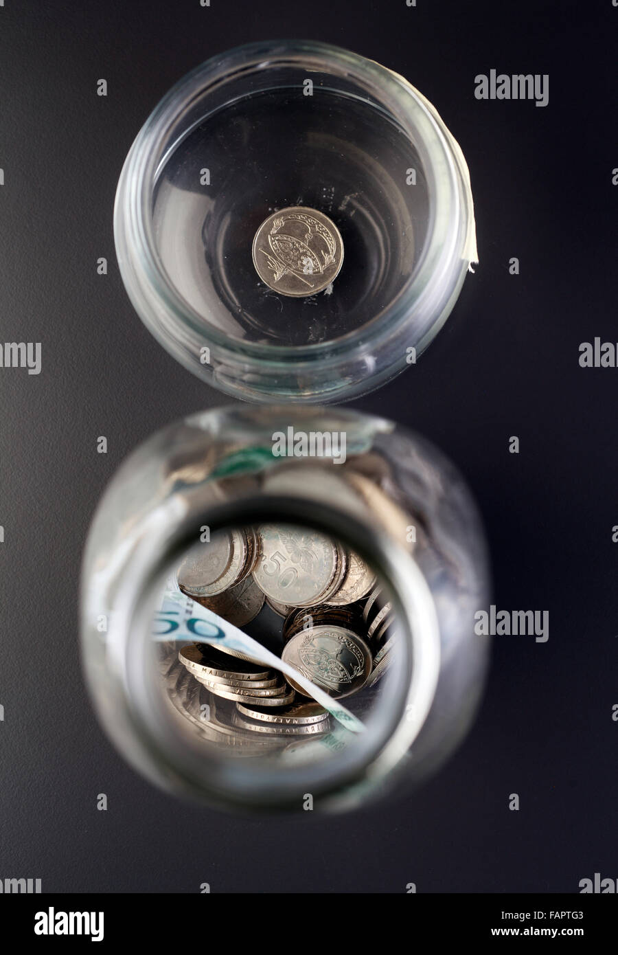 Group savings jars hi-res stock photography and images - Alamy
