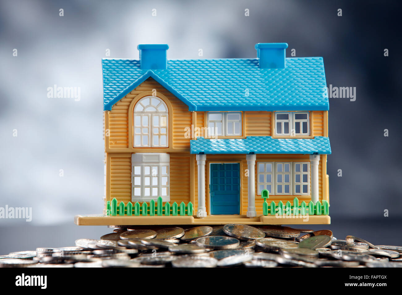 Toy on coins hi-res stock photography and images - Alamy