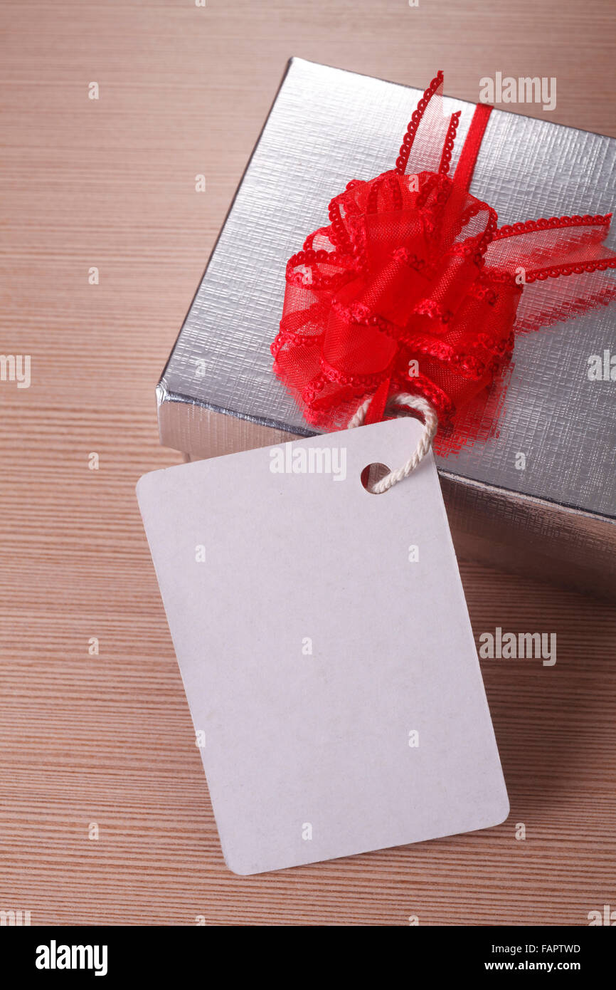 Present on the wooden table Stock Photo - Alamy