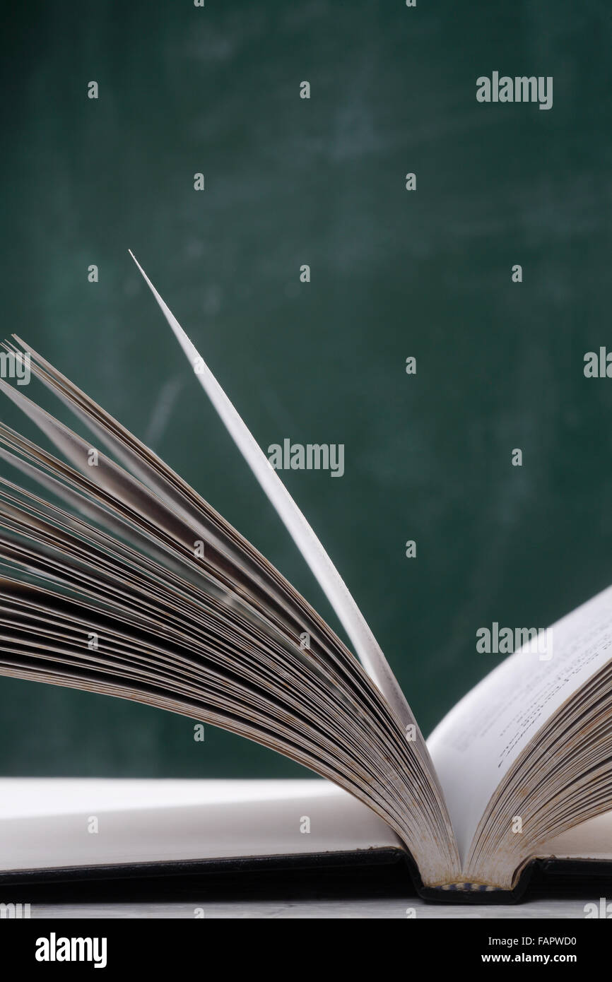 close up of the open book at classroom Stock Photo - Alamy