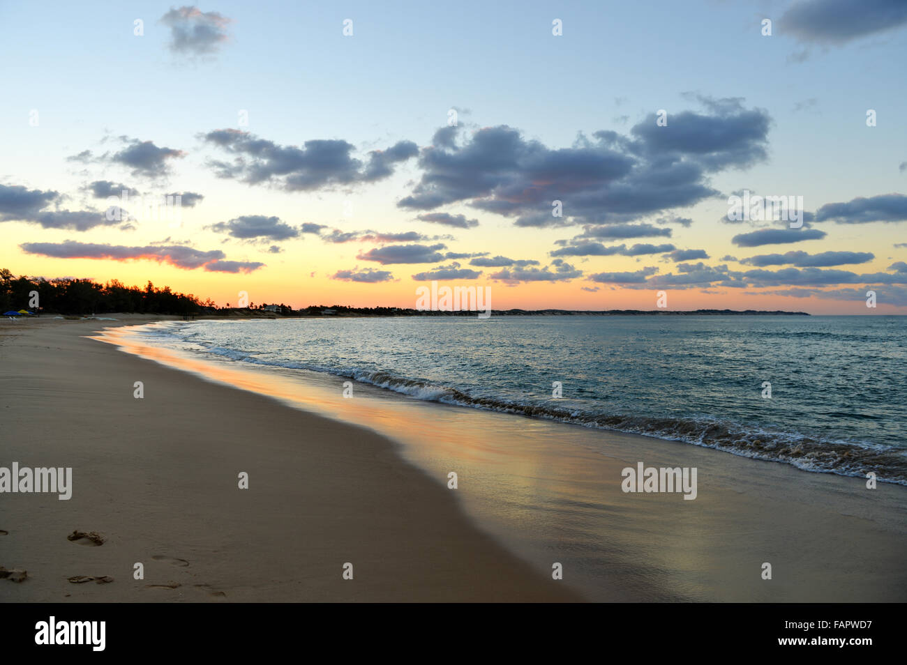 Tofo Beach at sunset in Mozambique. Tofo Beach is the dive capital of ...