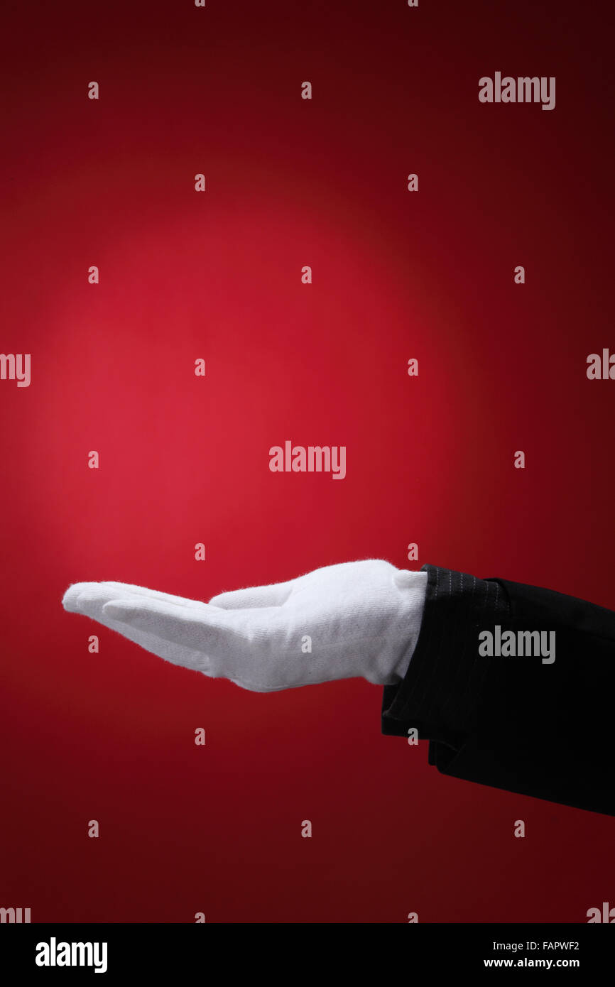 side view of the hand with white glove Stock Photo - Alamy