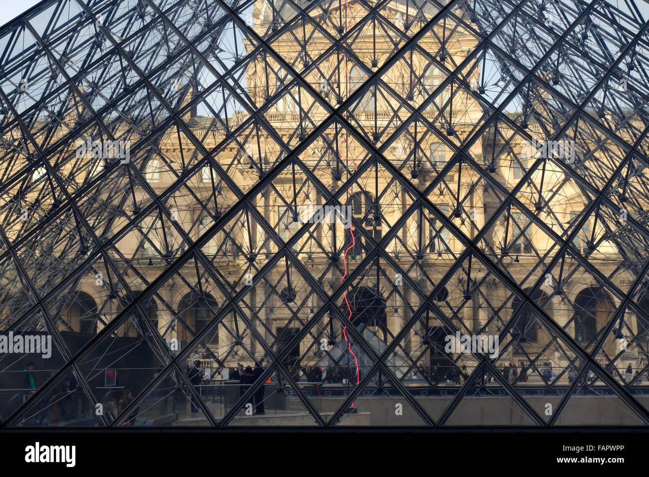 looking through glass Pyramid, Louvre Museum and Palace in Paris ...