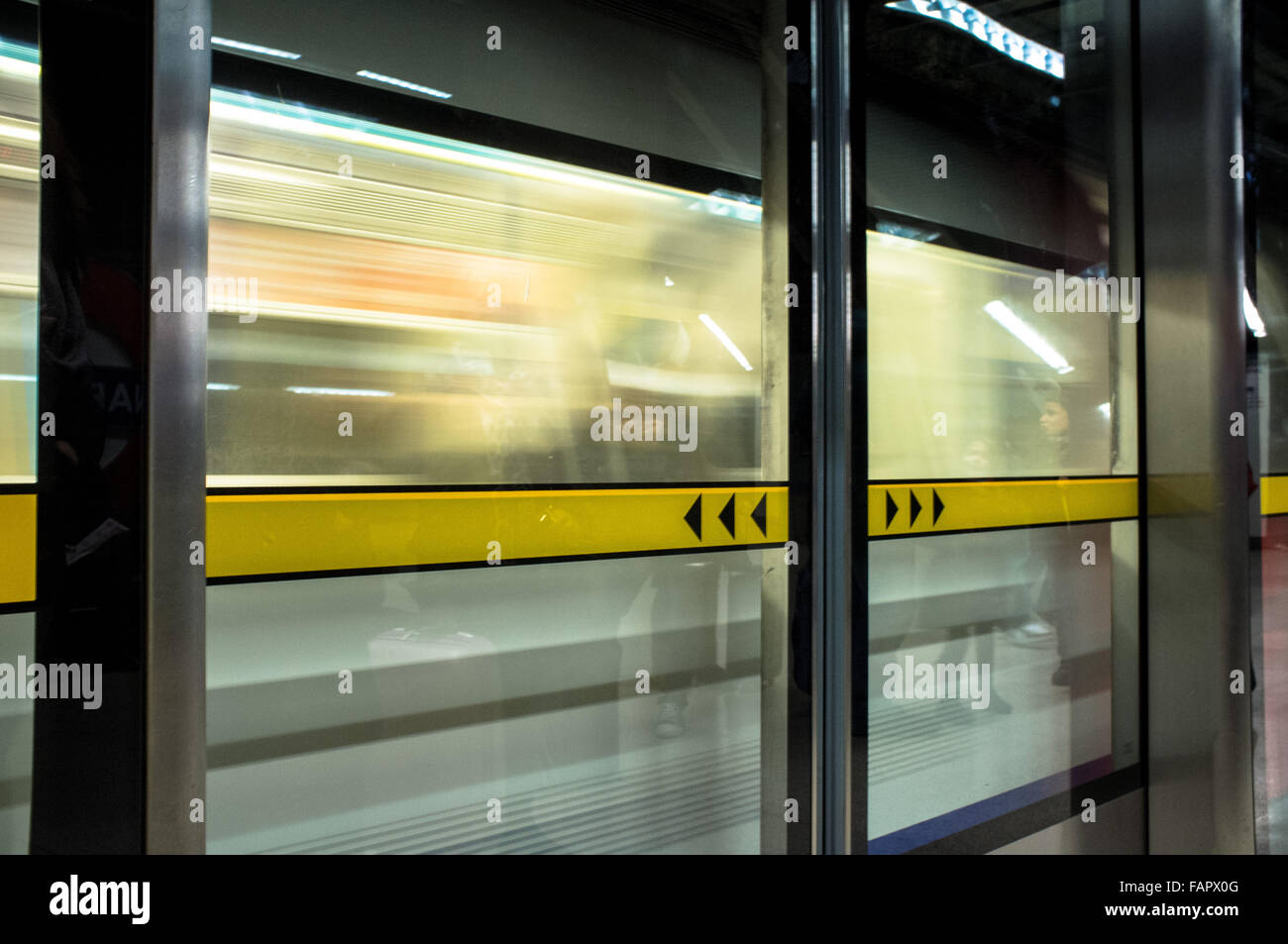 Closed safety doors on platform at a Jubilee Line underground station ...