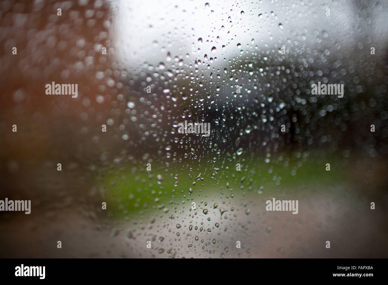 Rain on window Stock Photo - Alamy
