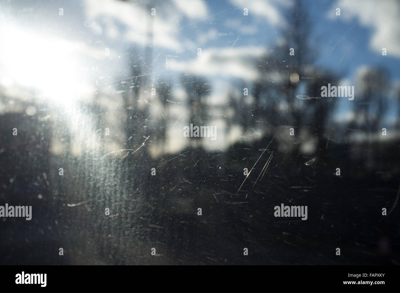 Trees and blue sky from window, with focus on window Stock Photo - Alamy