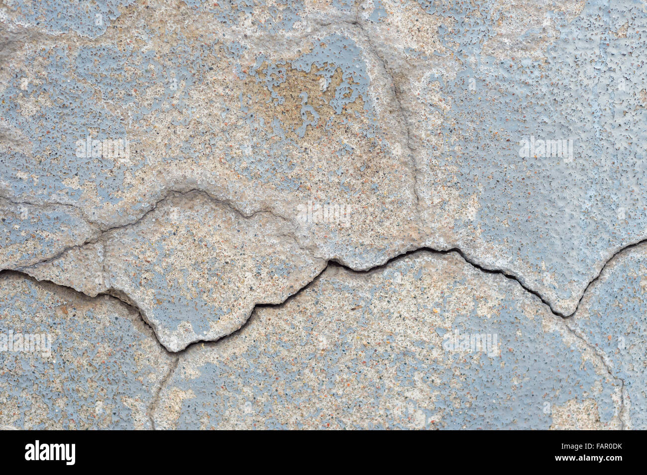 Detail of a blue pale wall with cracked paint Stock Photo - Alamy